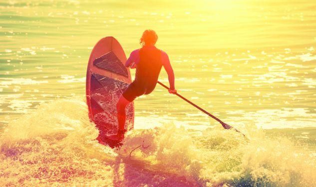 Work Out on Vacation: Full-Body Exercise of Stand-Up Paddle Boarding
